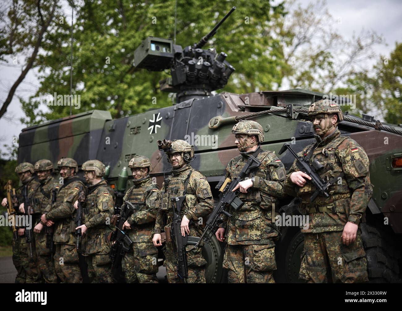 German soldiers stand in front of a Boxer military vehicle, a new type ...
