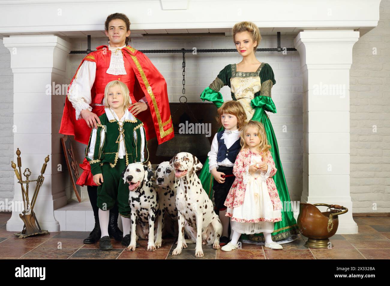 Father, mother in medieval costume with three children and three ...