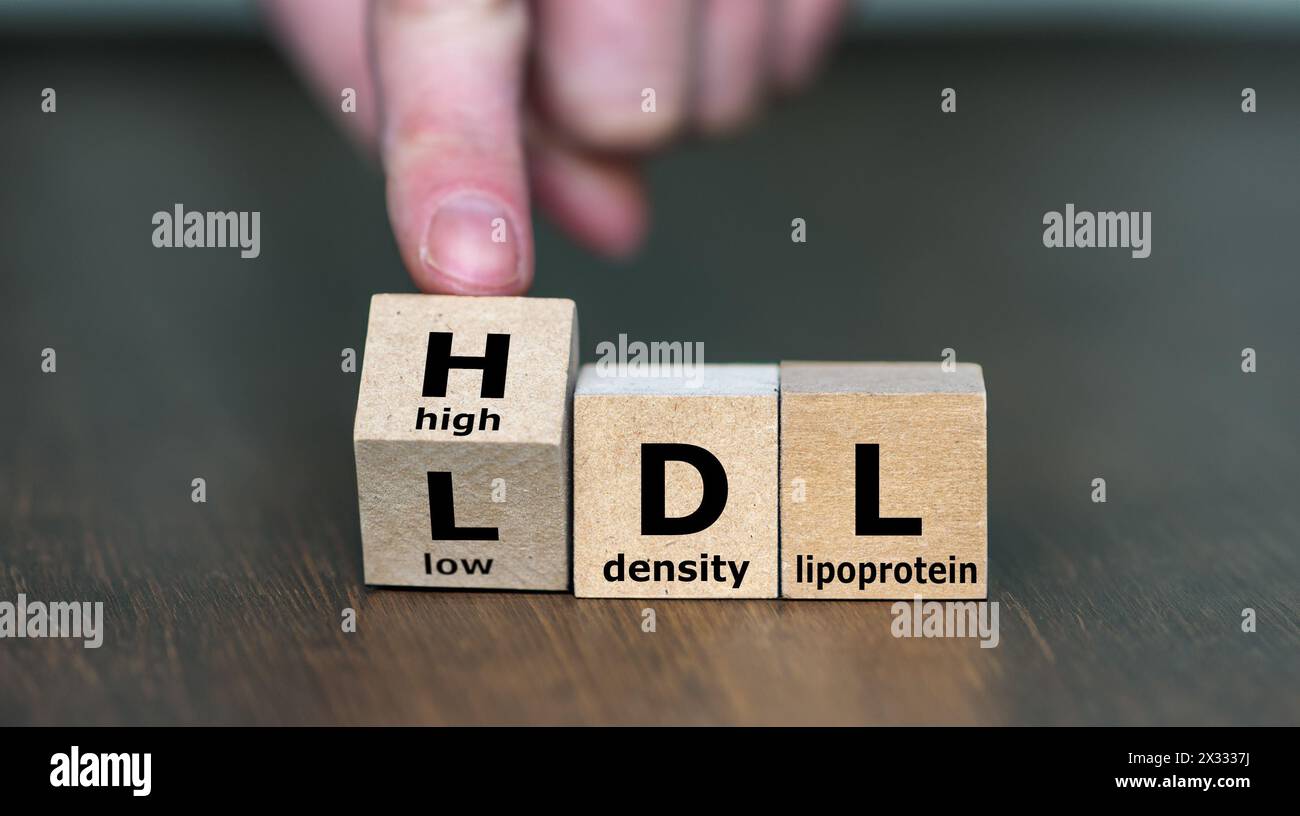 Hand turns cube and changes the expression LDL (low density lipoprotein ...