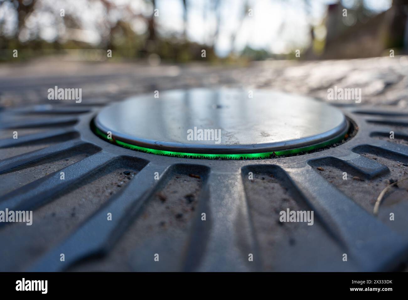The posts that have gone underground glow green, allowing vehicle ...