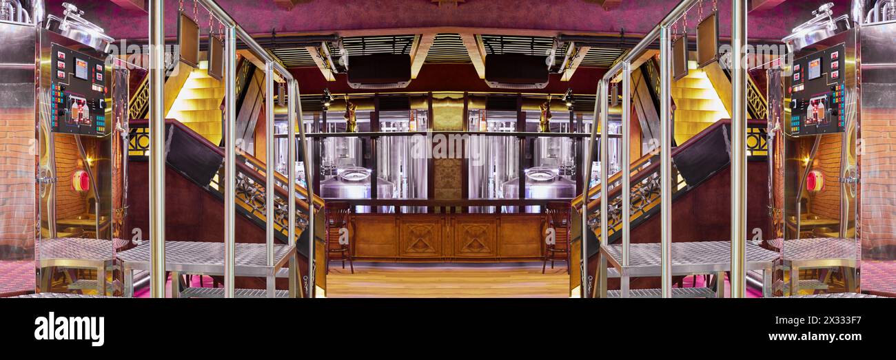 Hall in cafe with metal ladder, brewery tank and control board of ...