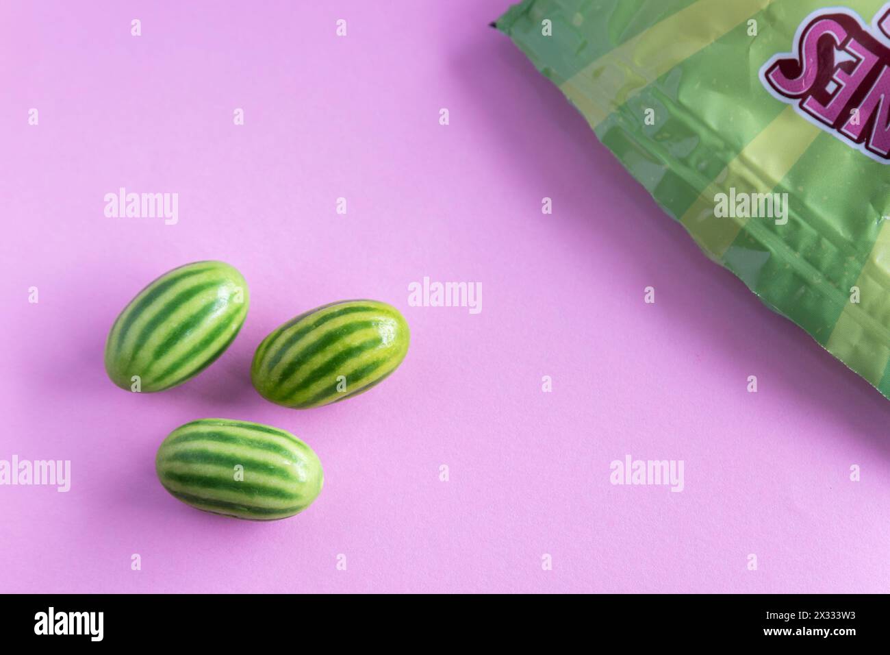 Candy, melon-flavored gum with an acidic interior Stock Photo - Alamy