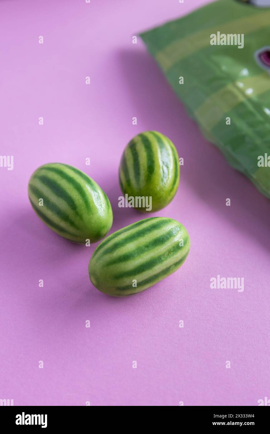 Candy, melon-flavored gum with an acidic interior Stock Photo - Alamy