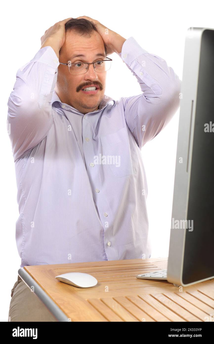 Employee in horror clutched his head while working on the computer ...