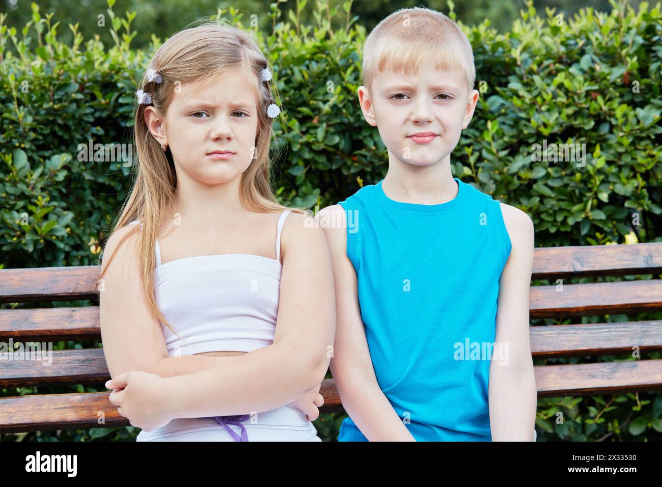 Children sit on bench hi-res stock photography and images - Alamy