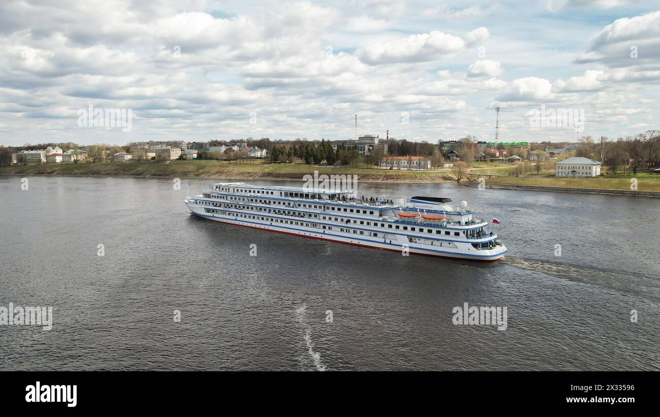 The passenger four-deck cruise ship goes along the Volga River Stock Photo - Alamy