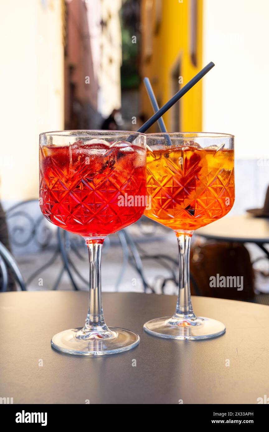 Aperol and Campari Spritz orange bitter long drink cocktail made with ...