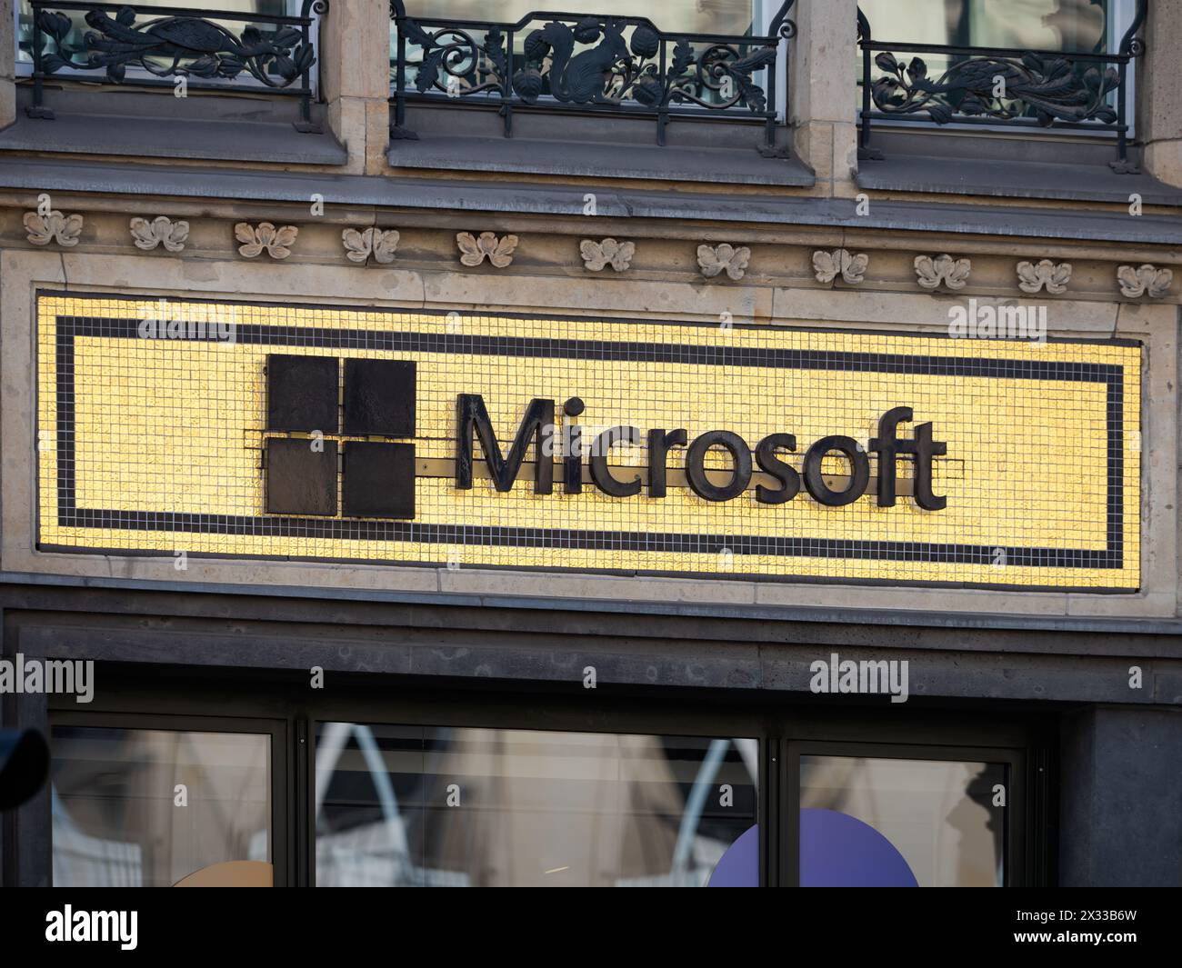 Microsoft logo sign on an exterior house wall. The American tech ...