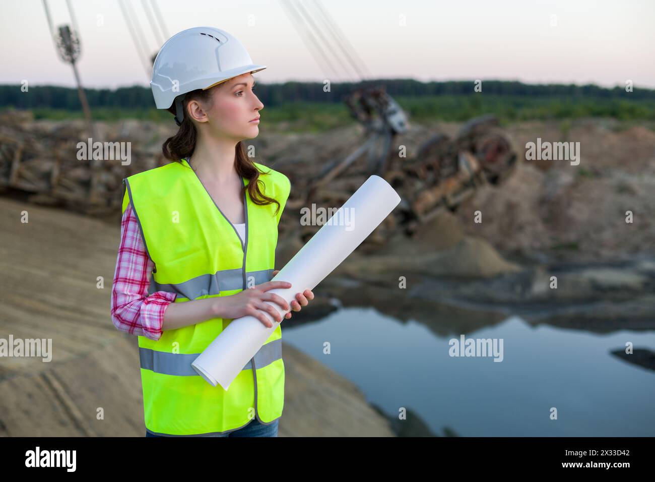female worker stands with drawings on a background of career Stacker ...