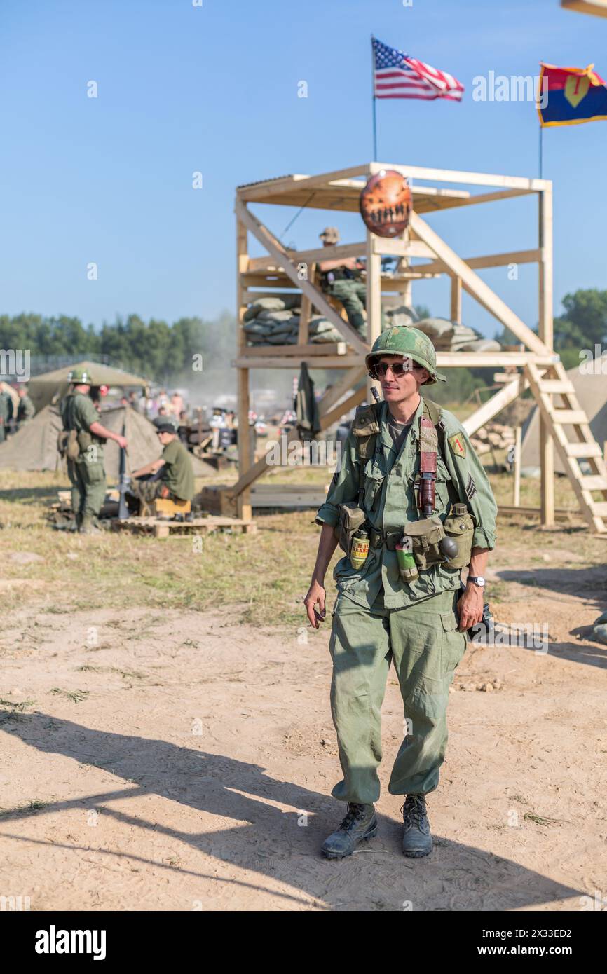 american soldger GI on a background of the observation tower with flags ...