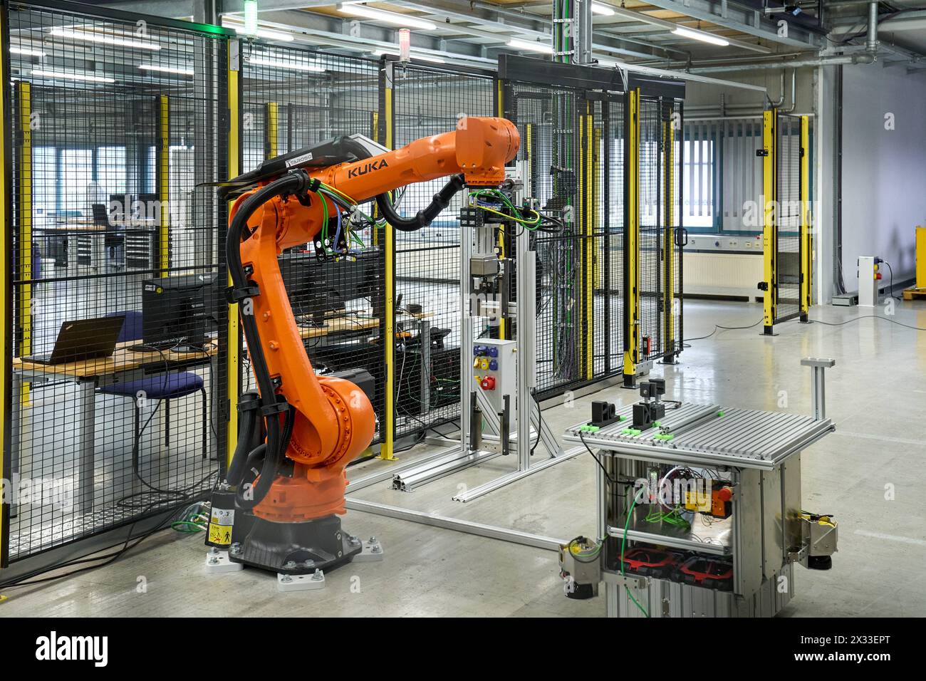 Augsburg, Bavaria, Germany - April 24, 2024: Kuka industrial robots on display in the AI ...