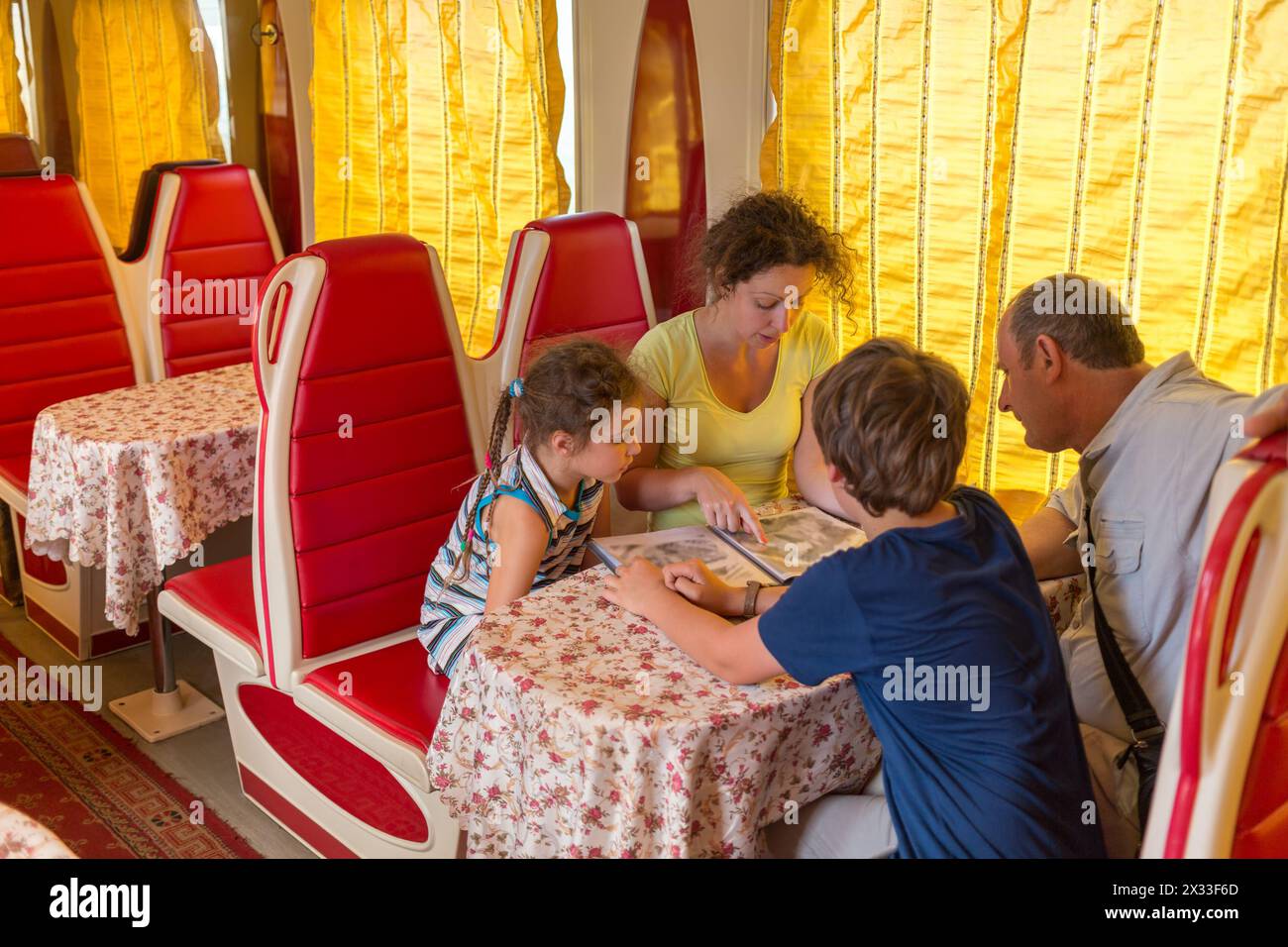 Adult family in the train hi-res stock photography and images - Alamy