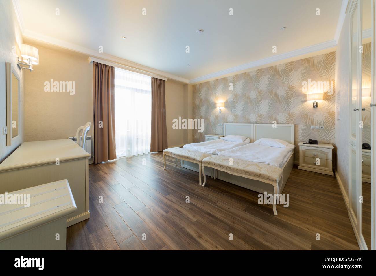 ADLER, RUSSIA - JULY 21, 2014: Interior of a hotel room with beds and ...