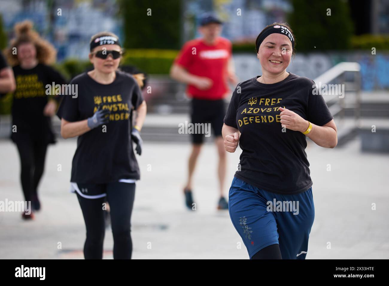Cheerful Ukrainian women running the distance at the Spartan Race ...
