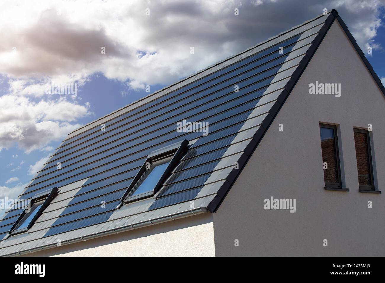 Solar roof: Detached house with solar roof tiles as a high-quality and ...