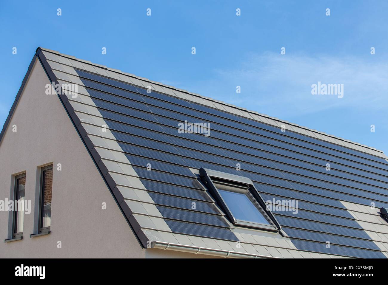 Solar roof: Detached house with solar roof tiles as a high-quality and ...