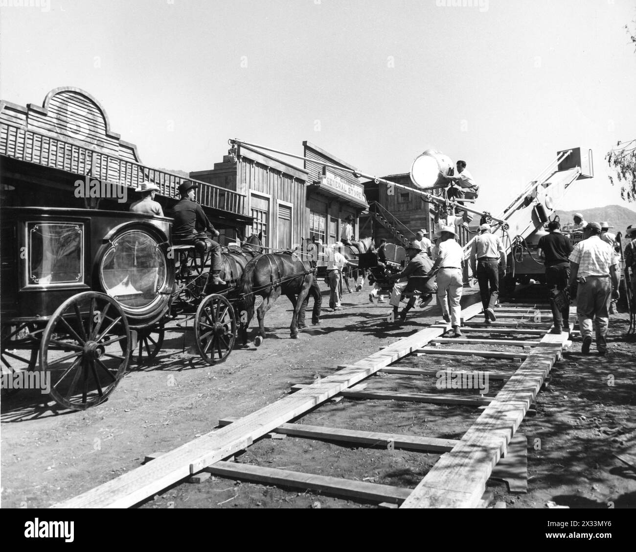 STEVE McQUEEN and YUL BRYNNER filming the funeral sequence at the ...