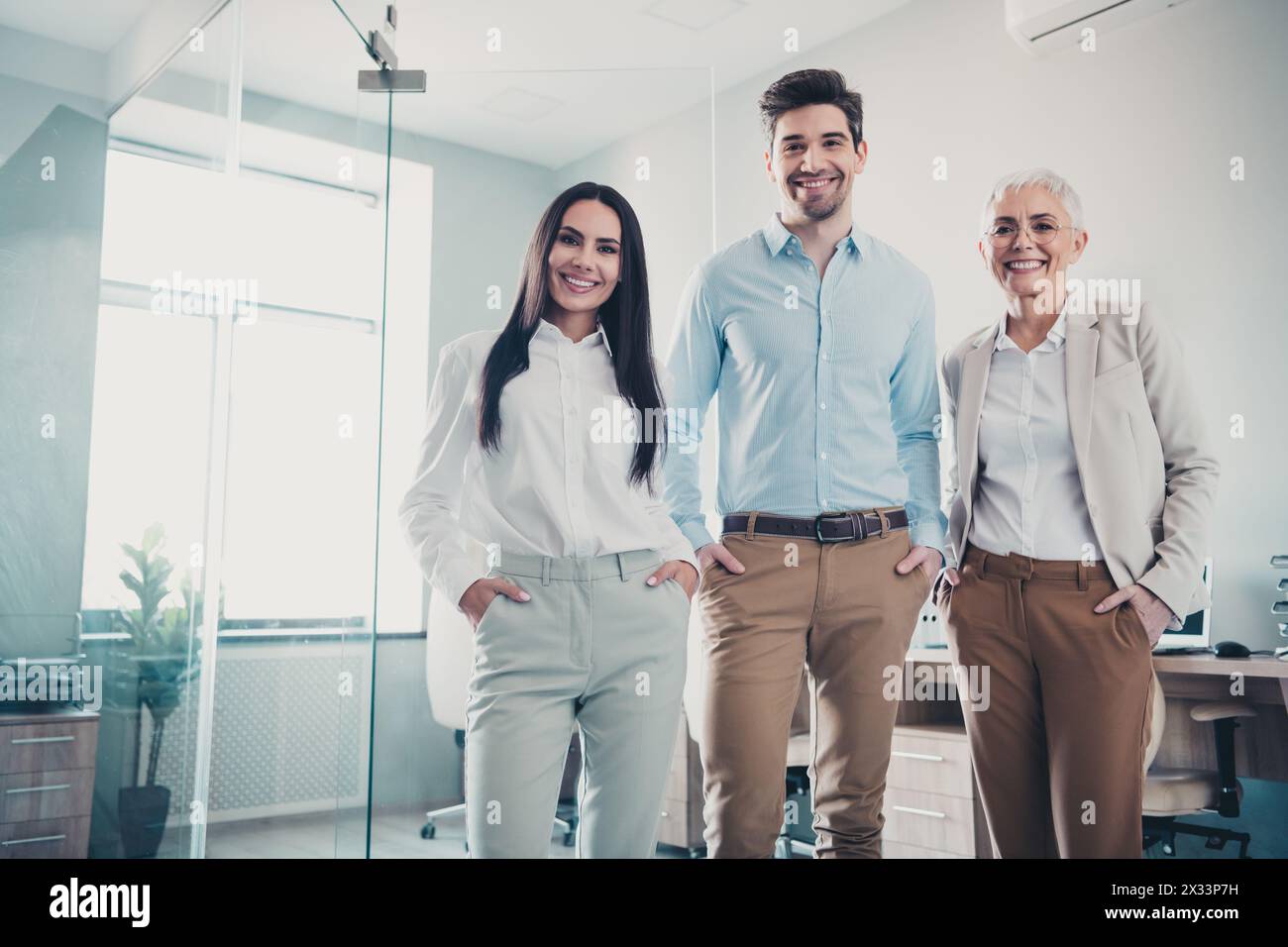 Photo of business people reliable man women standing in modern workstation Stock Photo - Alamy