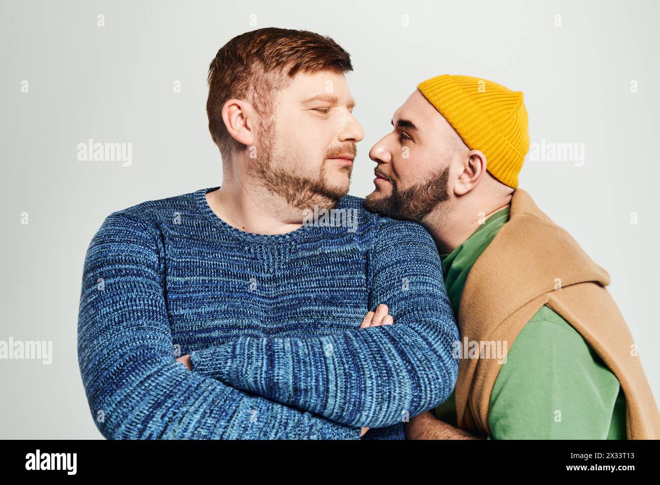 Two men stand hi-res stock photography and images - Alamy