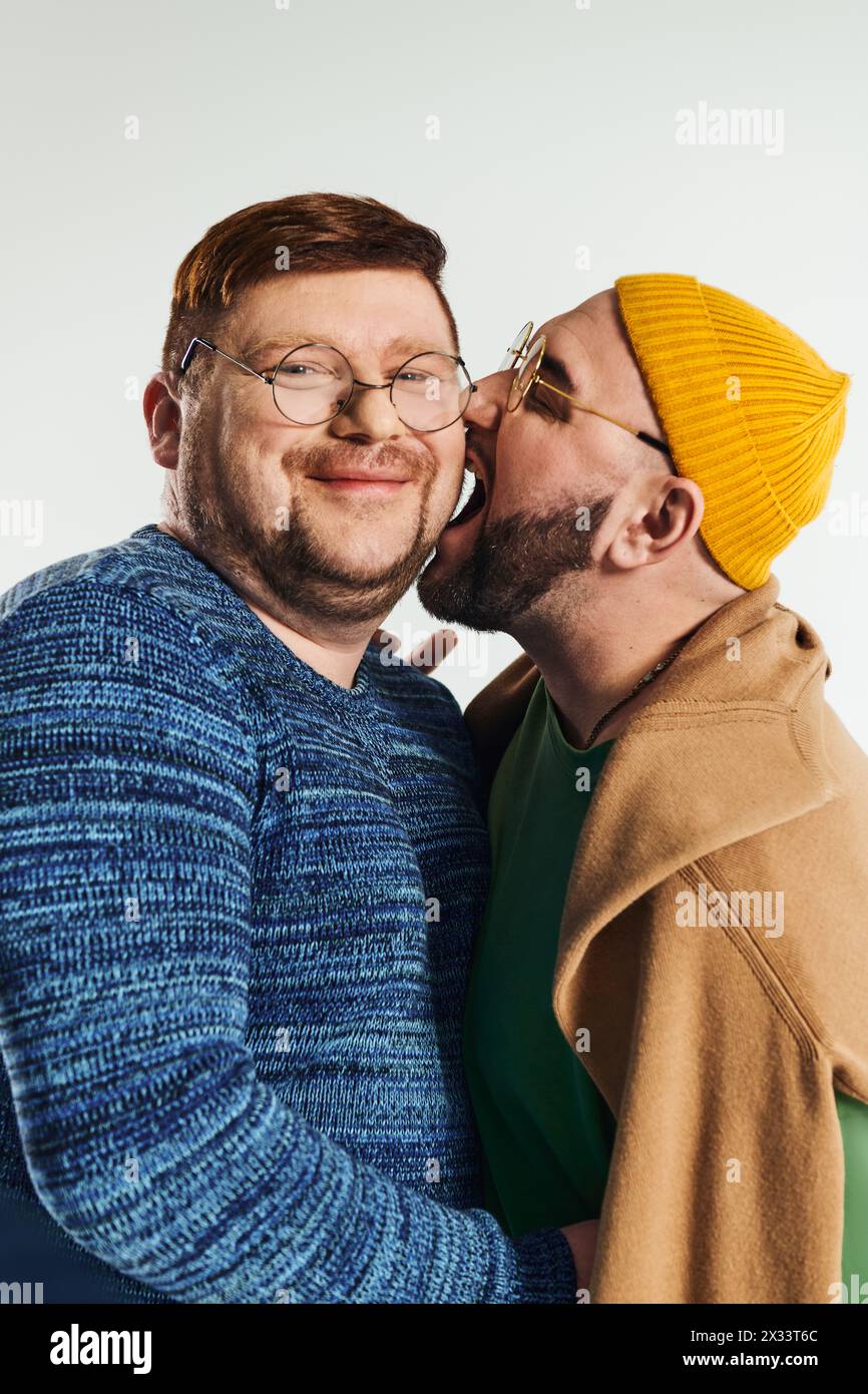 Two men proudly stand by each other Stock Photo - Alamy