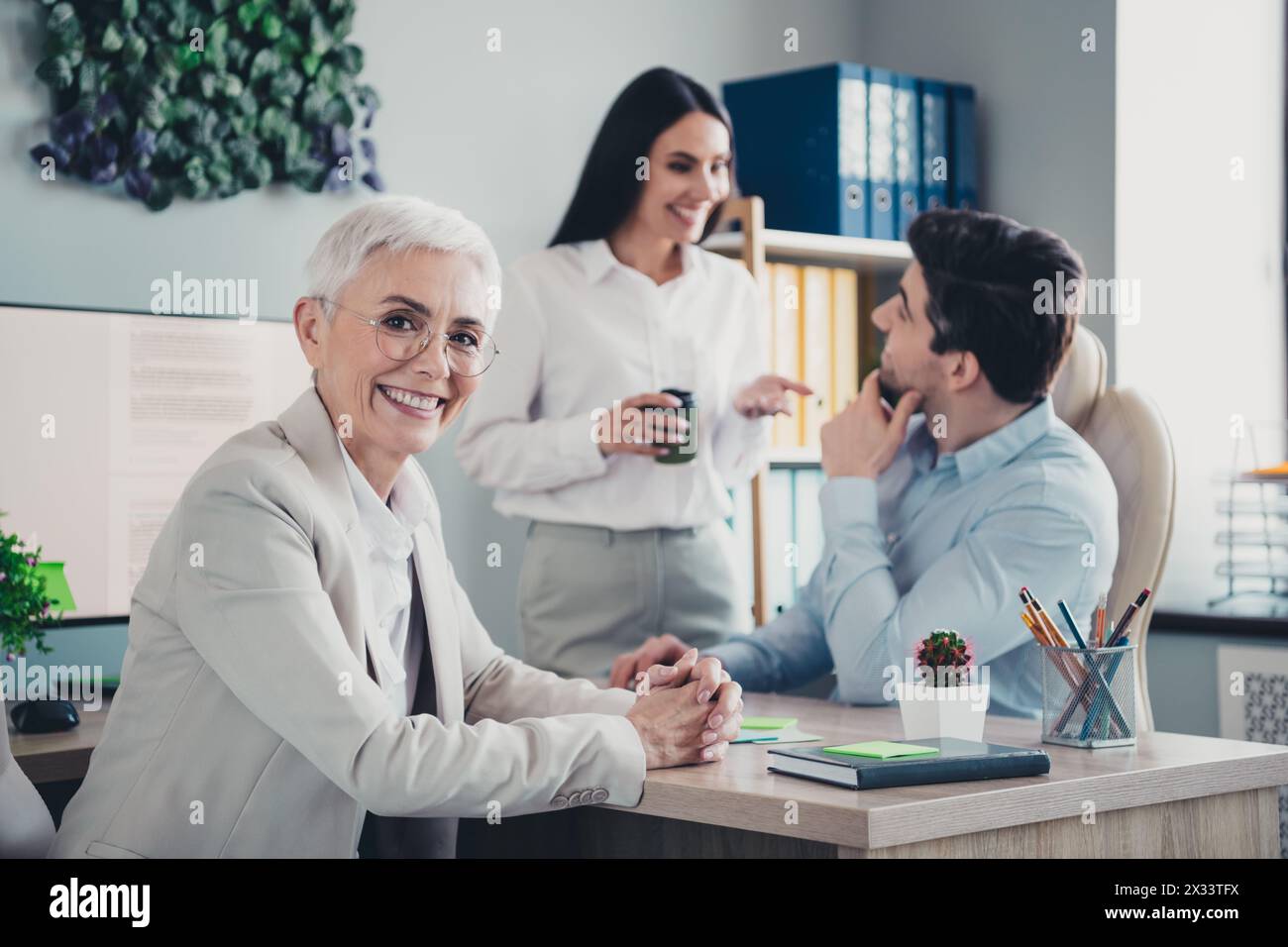 Photo of two employees mature boss woman create business plan office ...