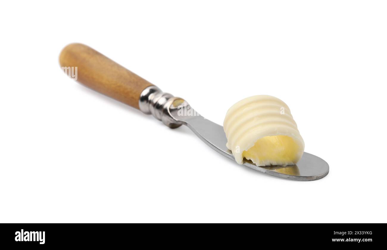 Butter curl on knife isolated on white Stock Photo - Alamy