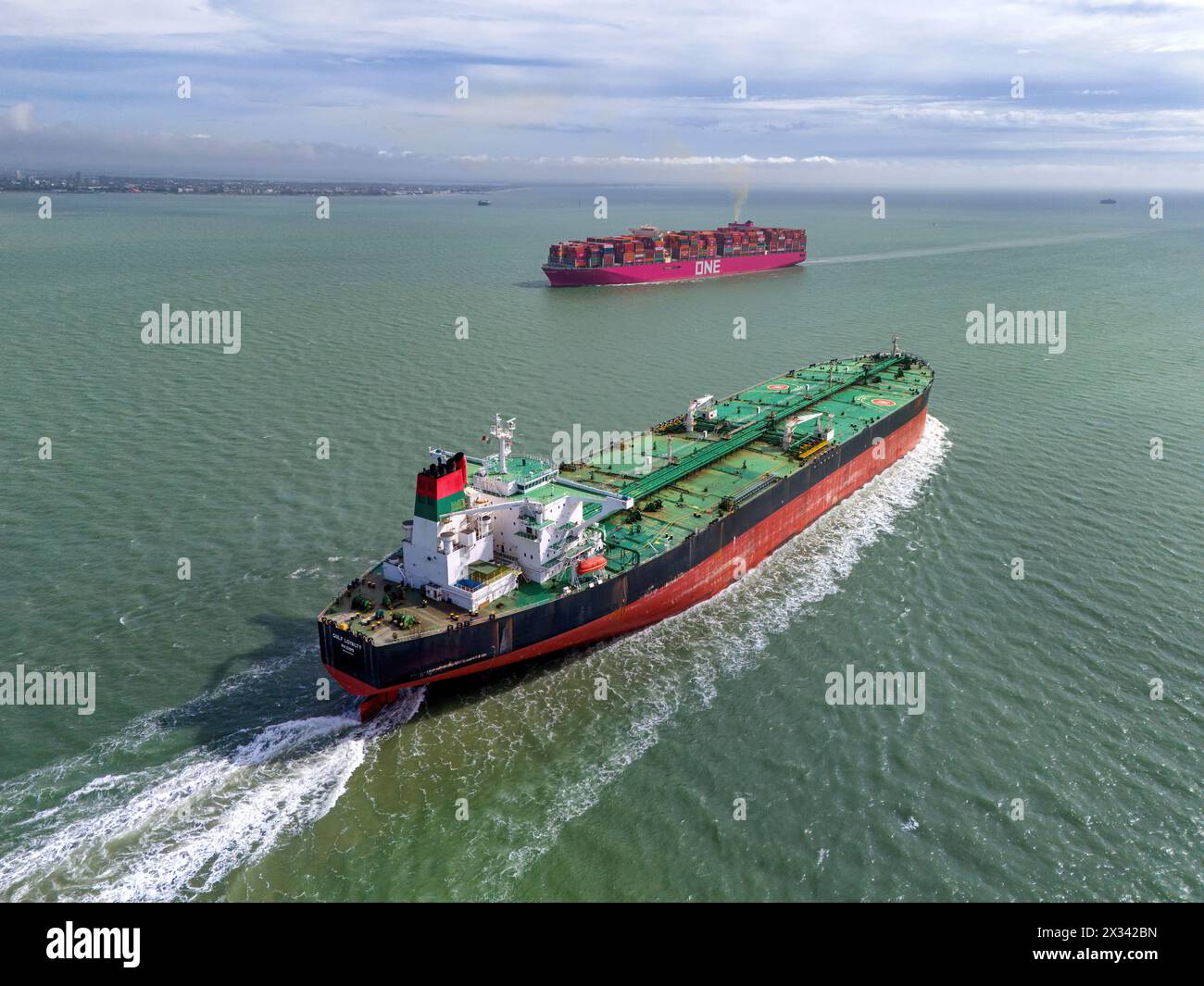 Aerial view of a Very Large Crude Carrier (VLCC) passing an Ultra Large ...