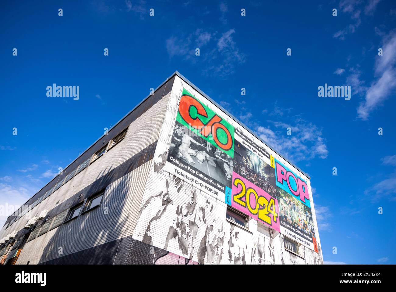 Cologne, Germany. 24th Apr, 2024. A large banner advertising the "c/o ...