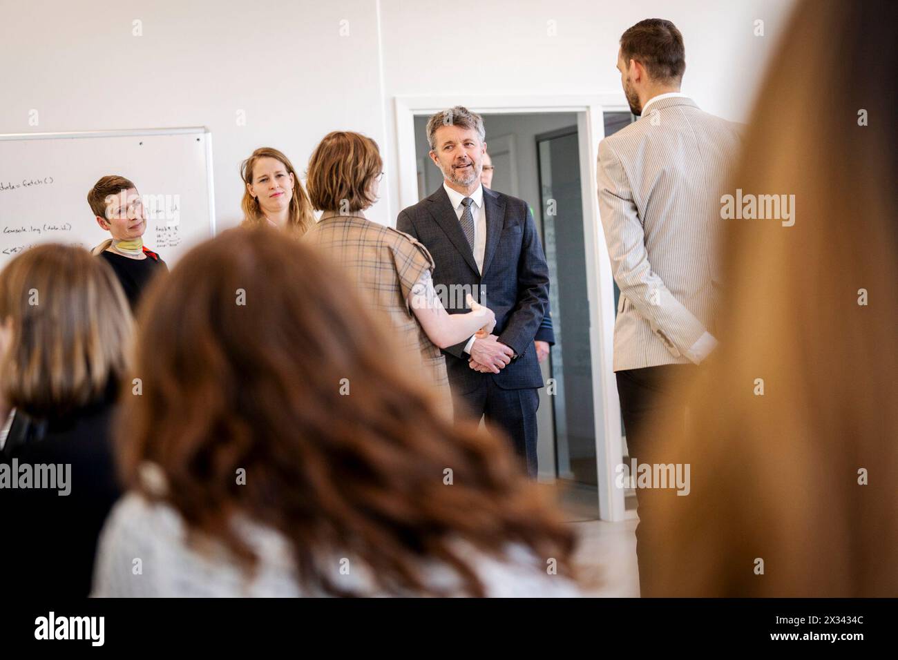 Copenhagen, Denmark. 25th Apr, 2021. King Frederick X talks with rector ...