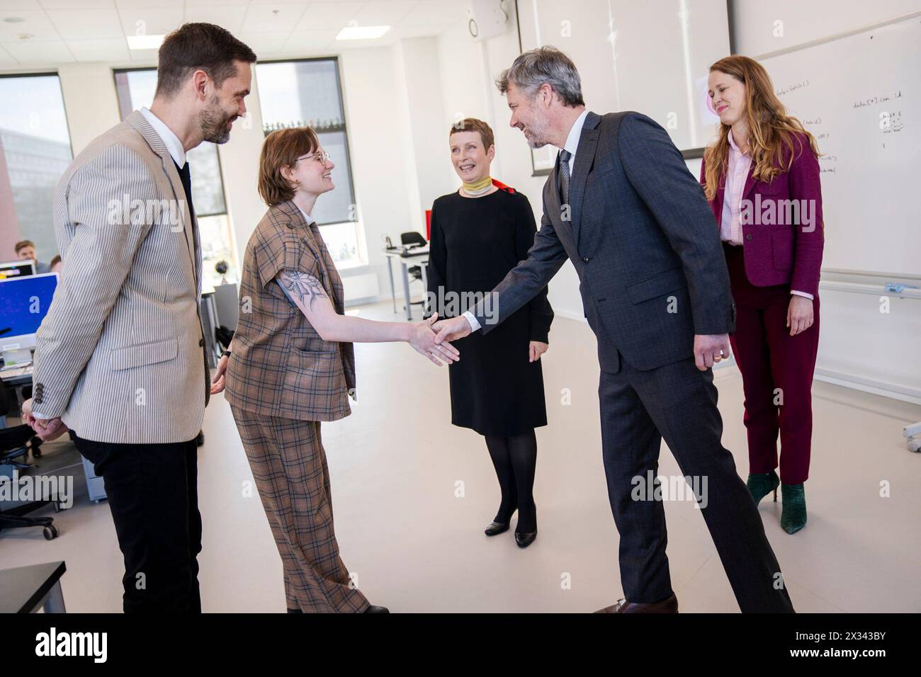 Copenhagen, Denmark. 24th Apr, 2024. King Frederik X greets together ...