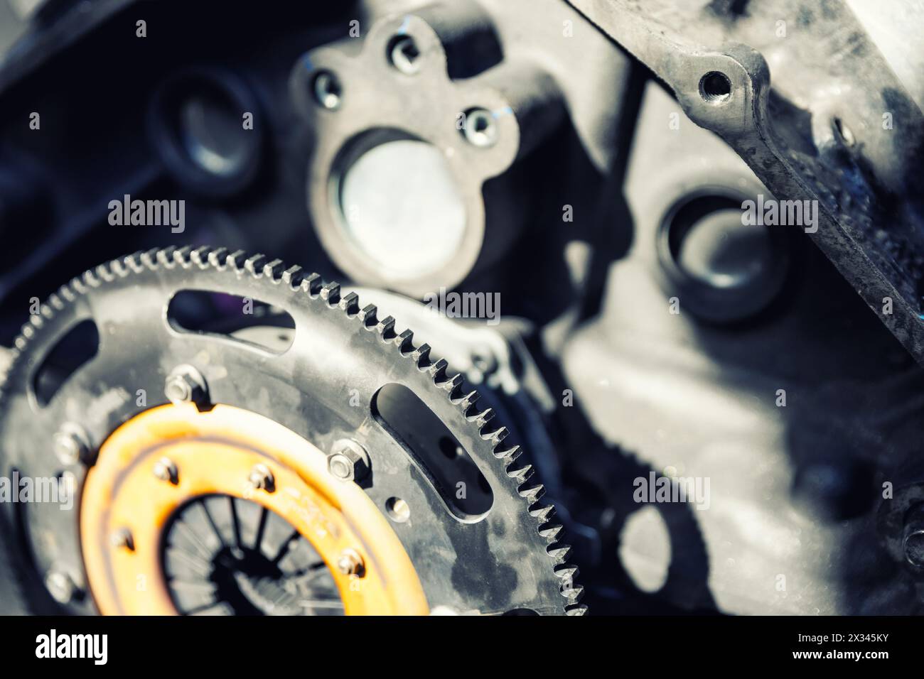 Closeup car racing motorsport engine flywheel parts garage workshop ...