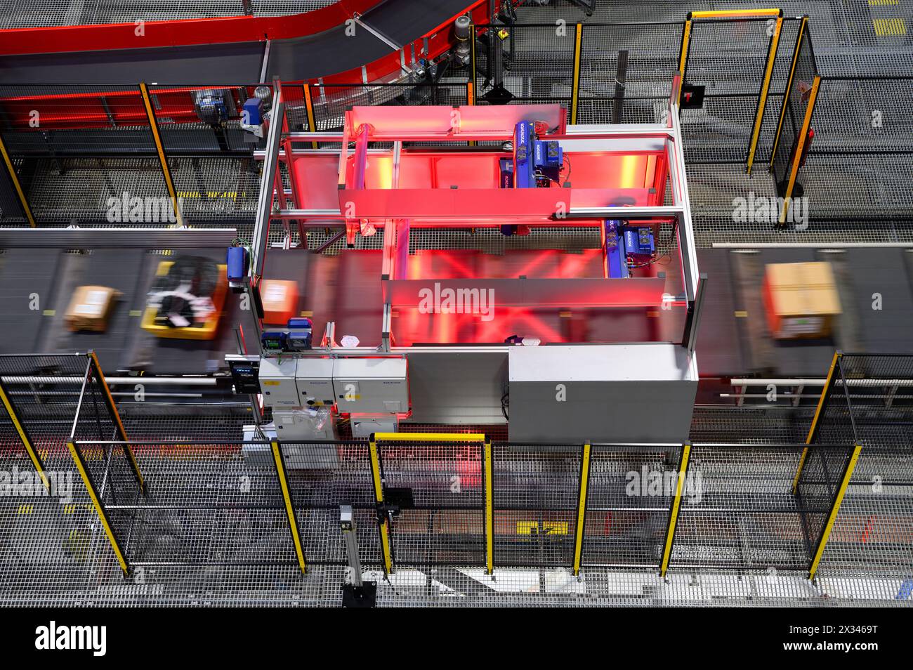 Istanbul, Turkey. 23rd Apr, 2024. Packages and parcels run on conveyor ...