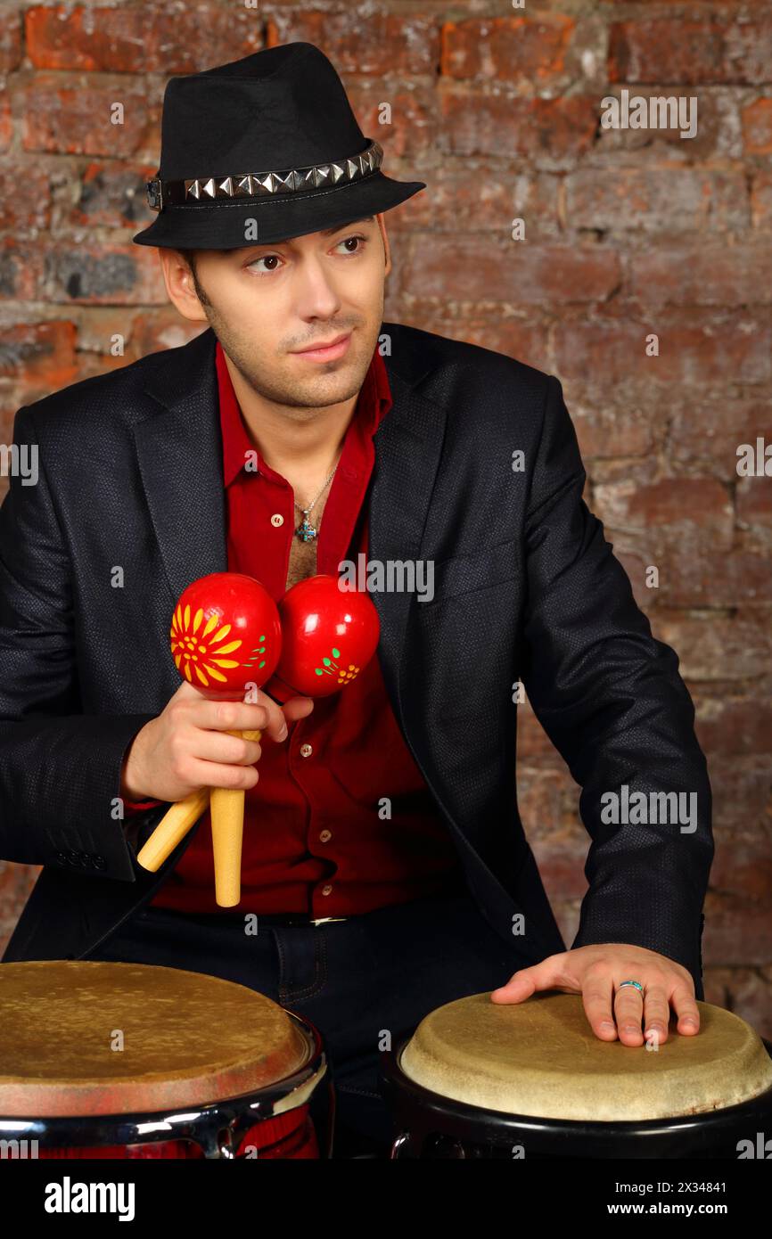 Man playing maracas hi-res stock photography and images - Alamy
