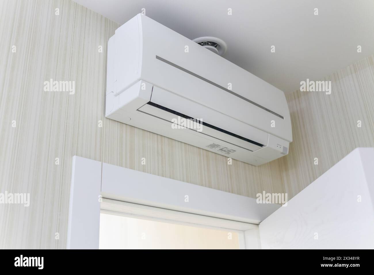 White air conditioner attached hi-res stock photography and images - Alamy