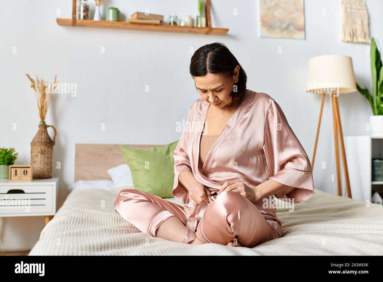 Mature woman in nightwear at home hi-res stock photography and images ...