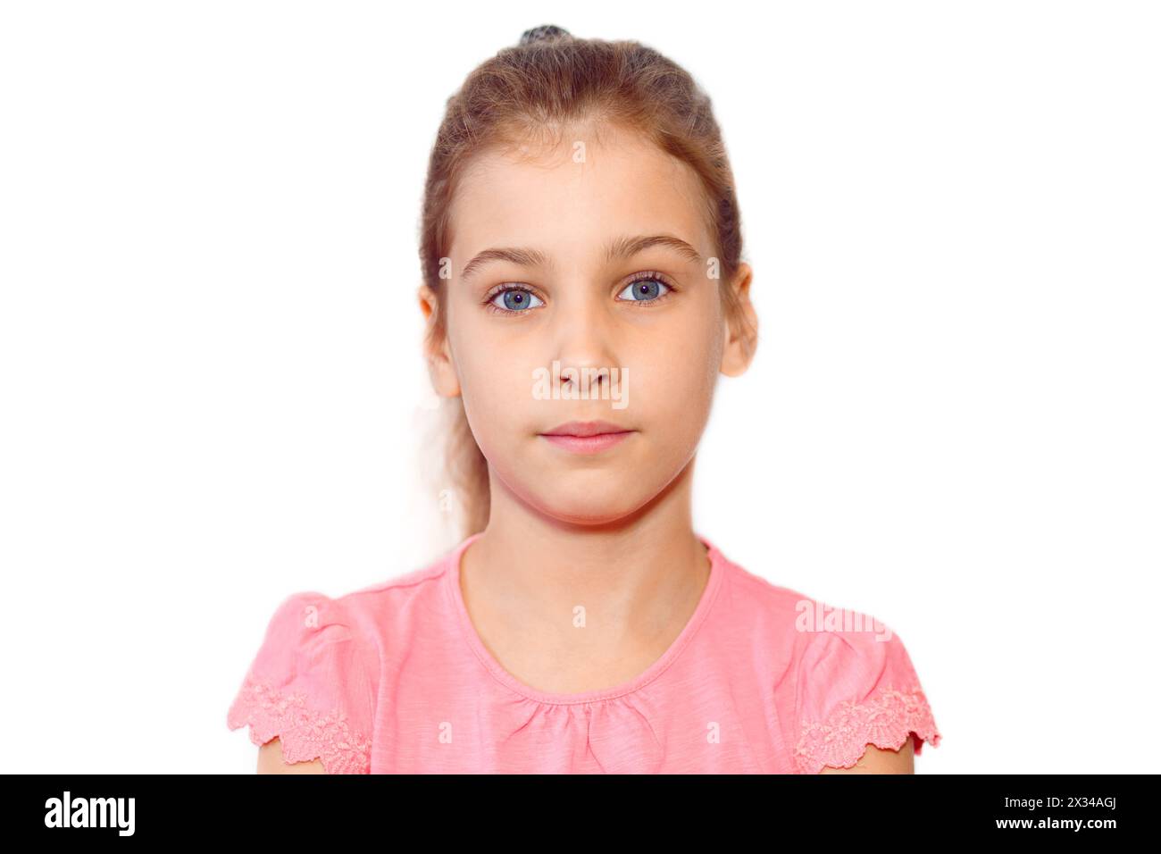Portrait of teen girl without emotions in pink blouse isolated on white ...