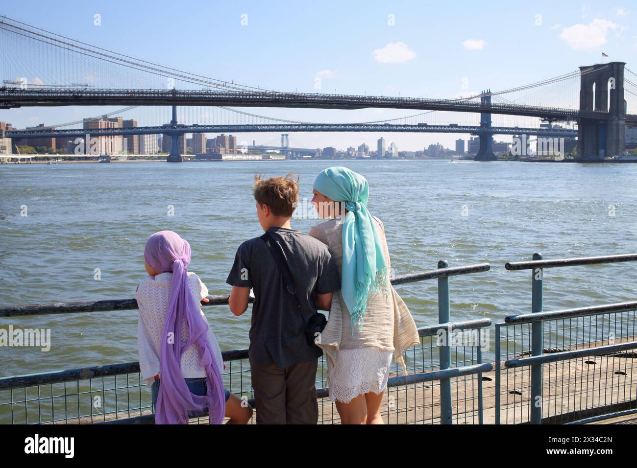 Boy standing on the promenade in a port hi-res stock photography and ...