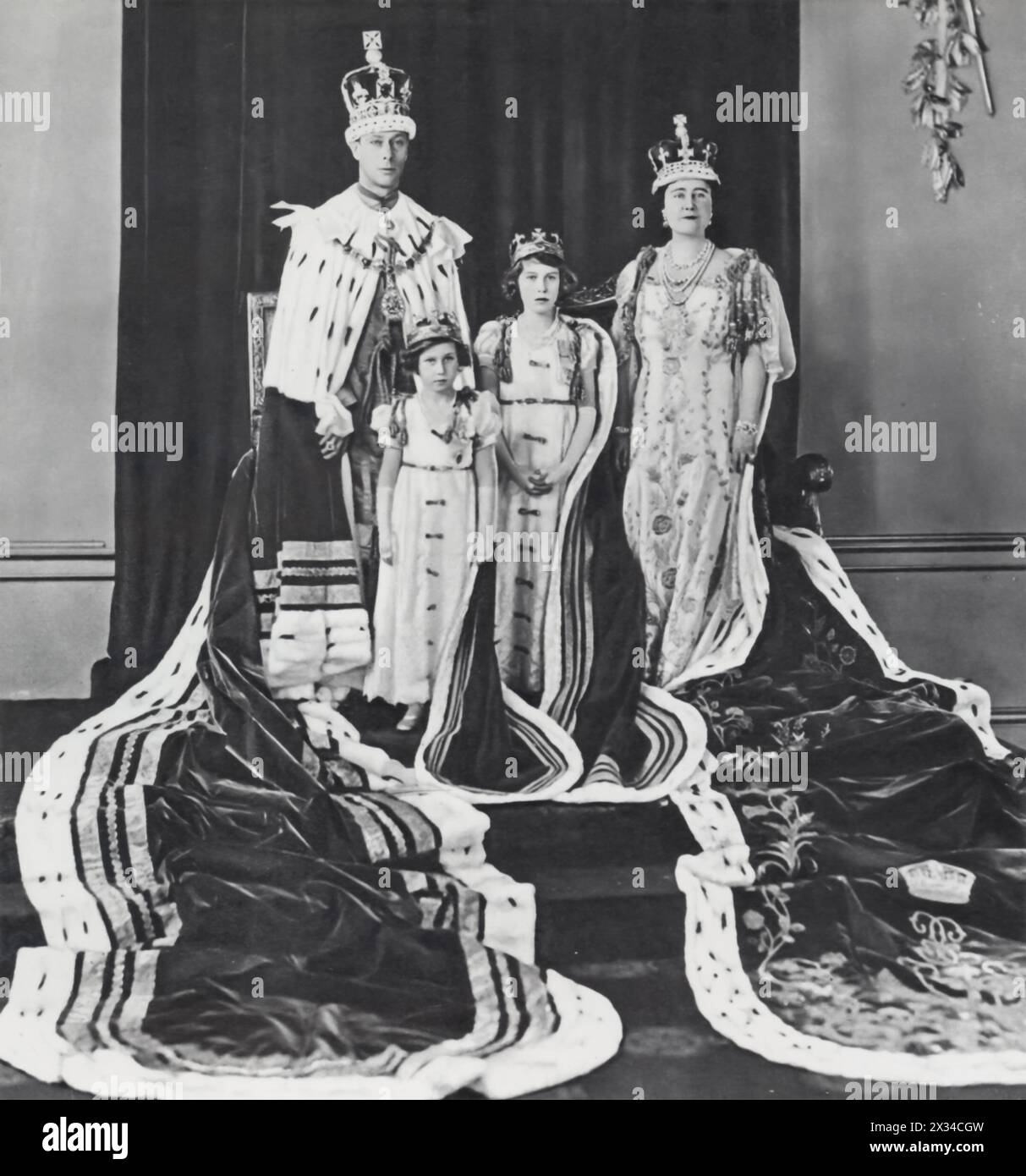 This photograph captures the Royal family in their ceremonial robes on ...