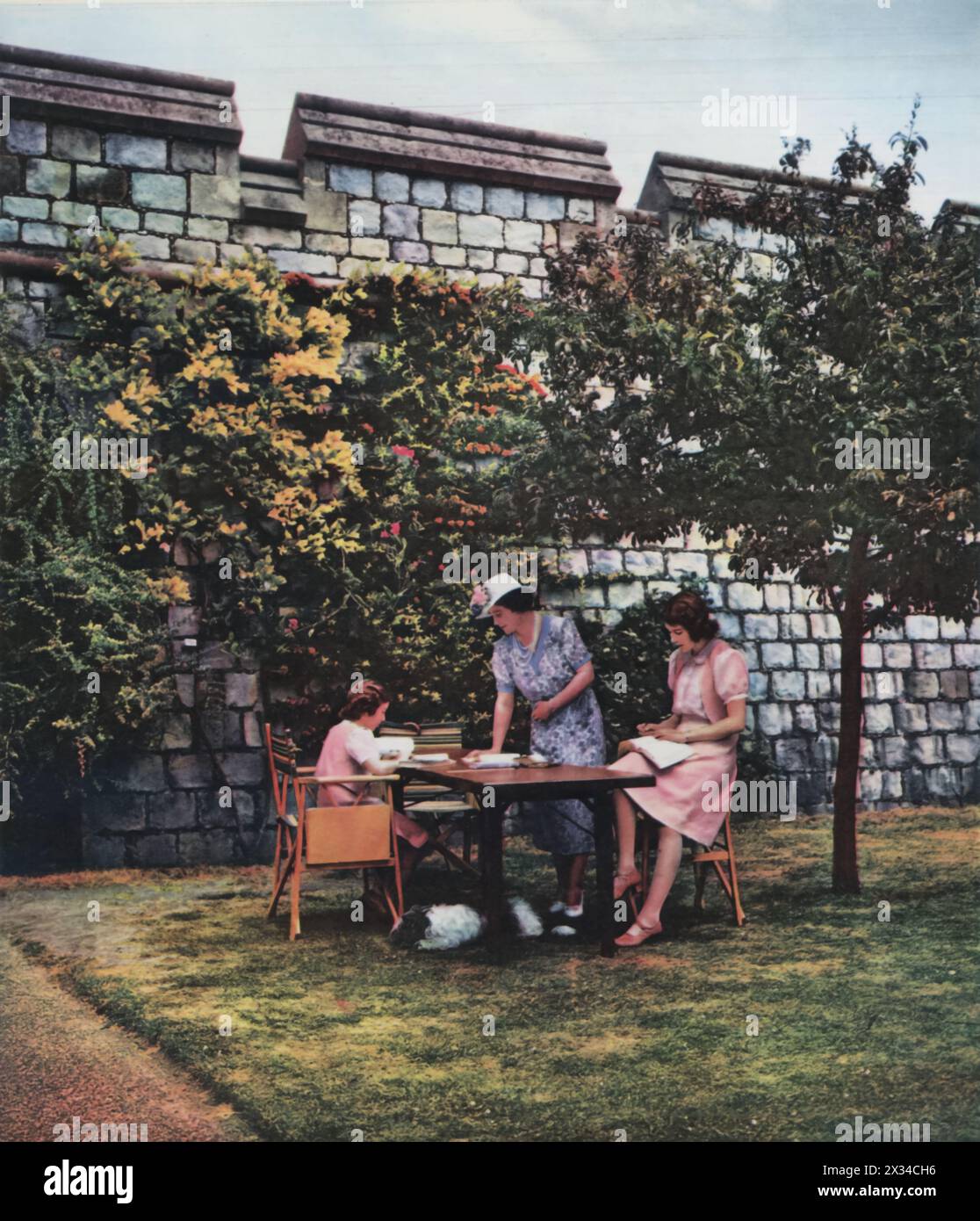 This photo captures Queen Elizabeth alongside her two daughters ...