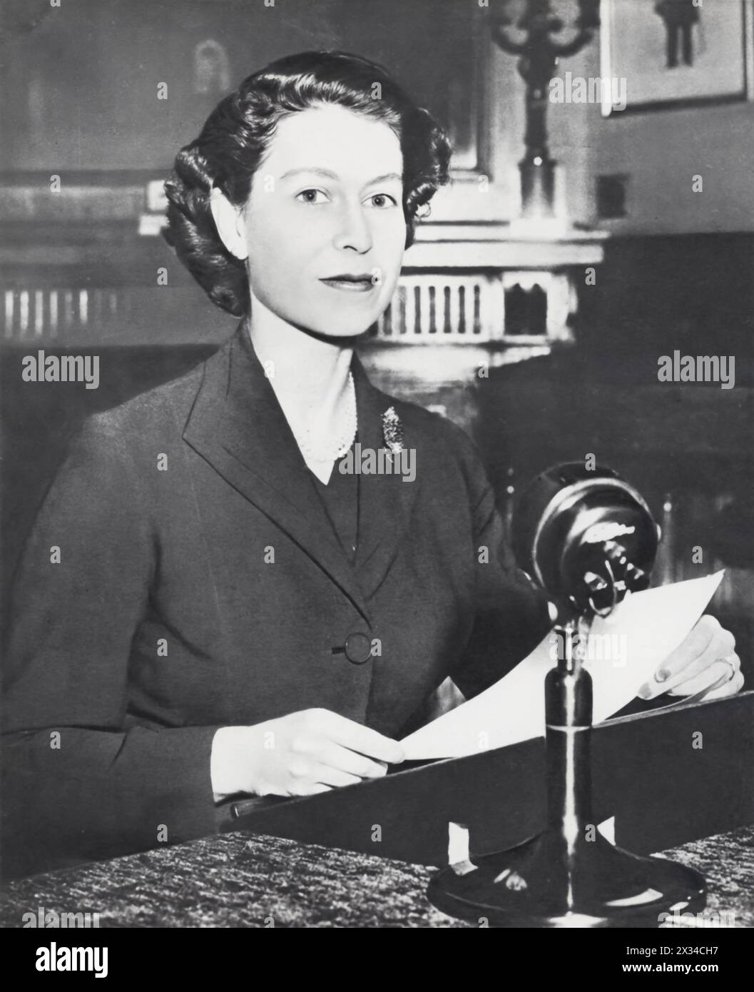 This photograph captures Queen Elizabeth II moments before she makes a ...