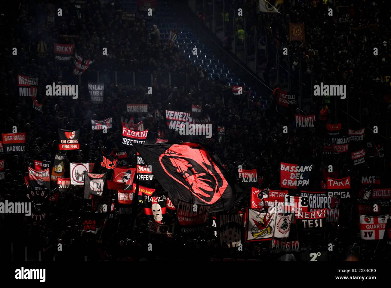 Milan fans cheer on during the Europa League football match between AS ...