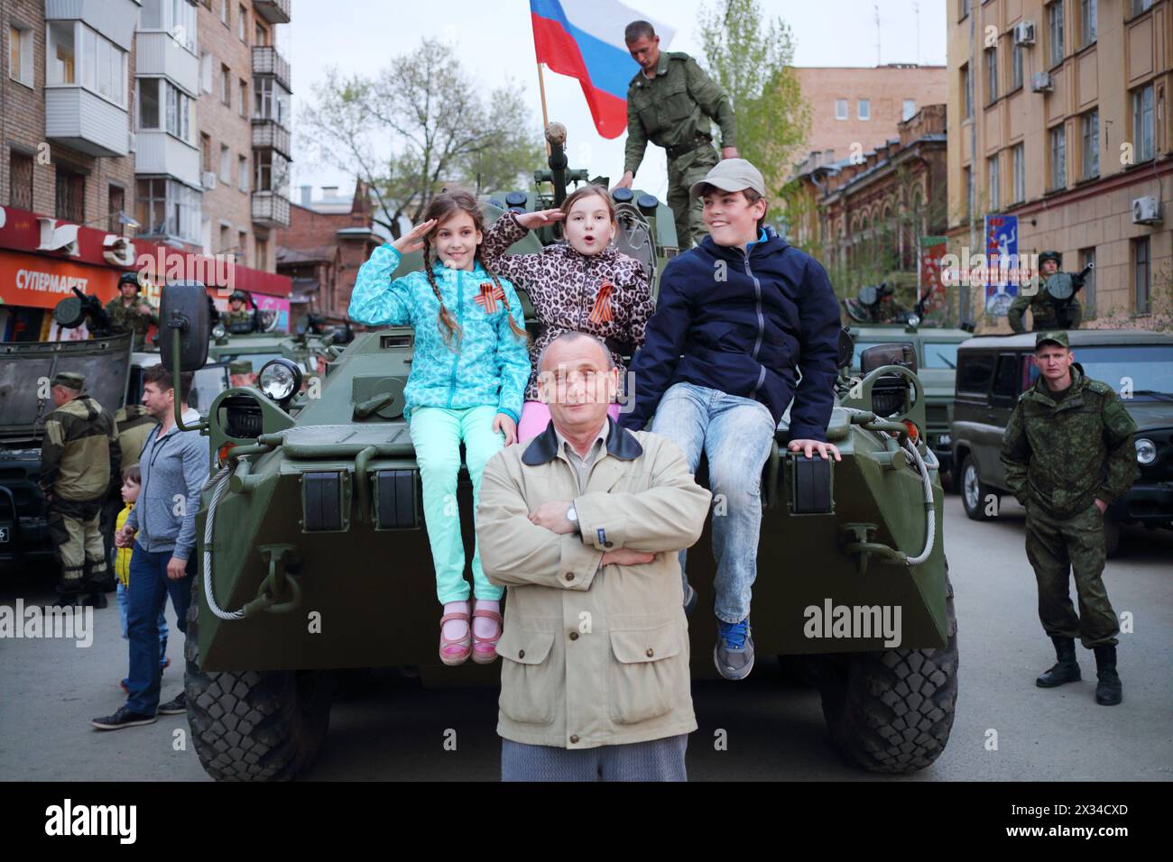 SAMARA - MAY, 6, 2015: Boy, man and two girls (with model releases ...
