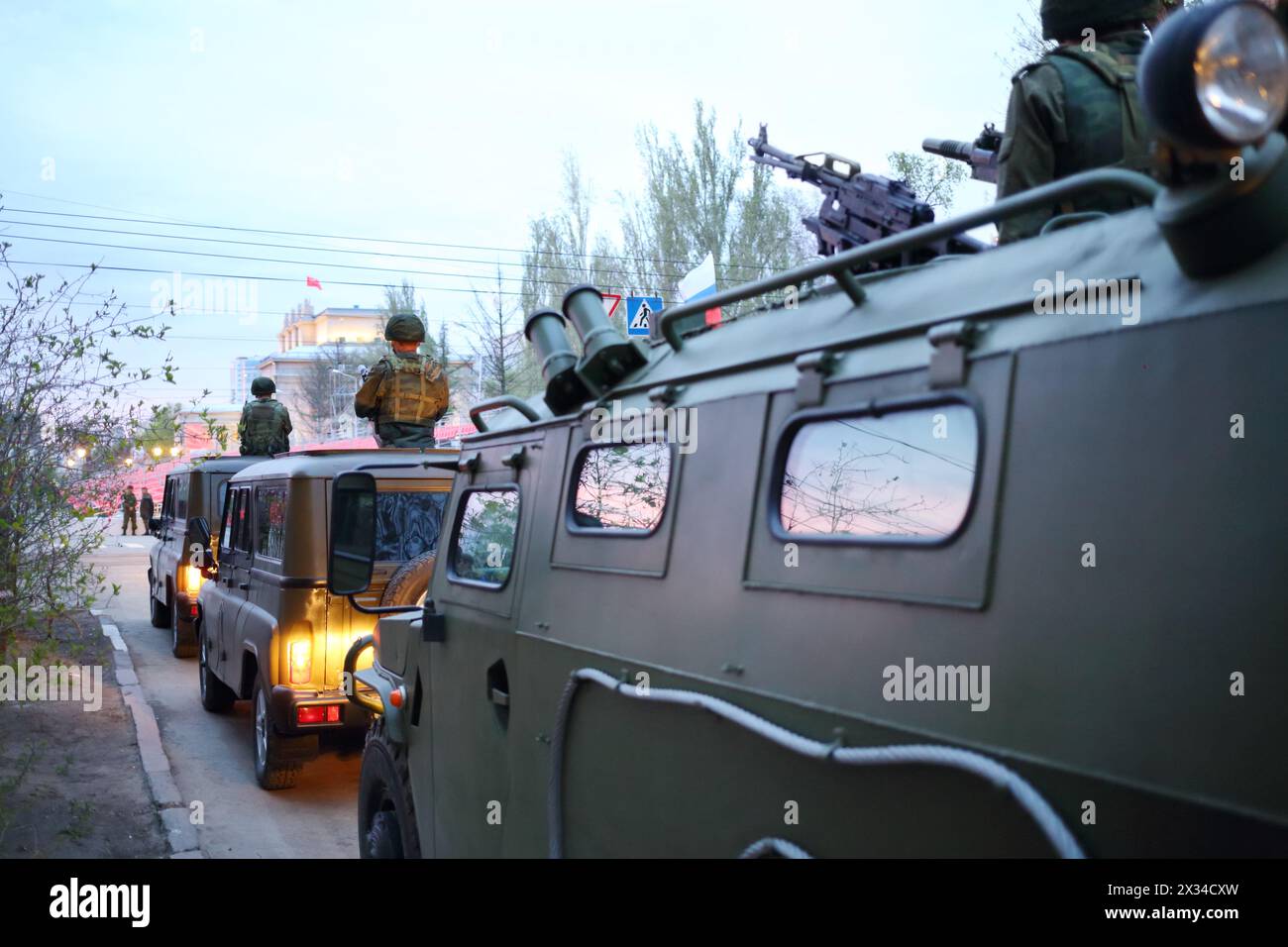 Soldiers on armored vehicles and military trucks on streets of Samara ...