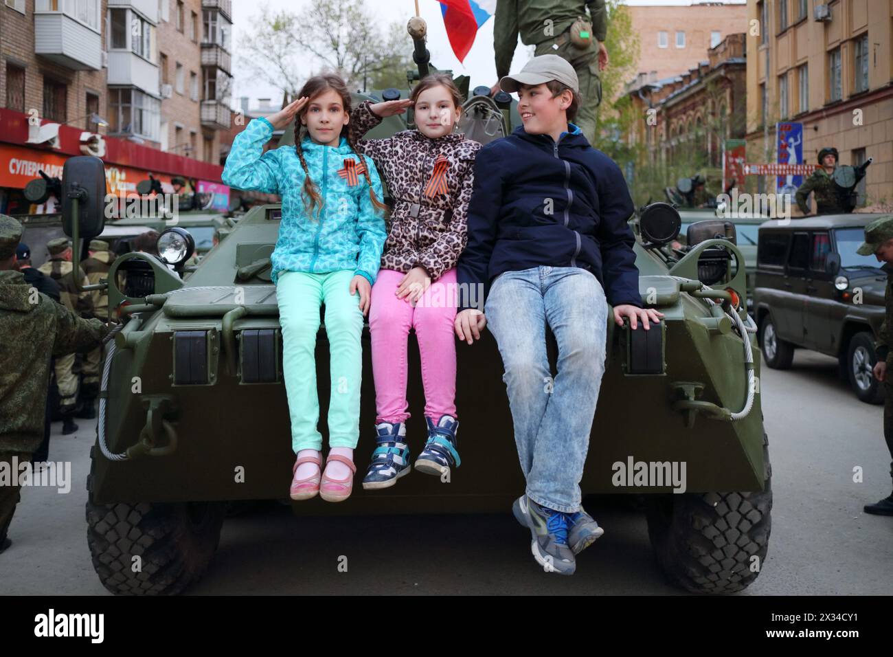 SAMARA - MAY, 6, 2015: Boy and two girls (with model releases) sitting ...