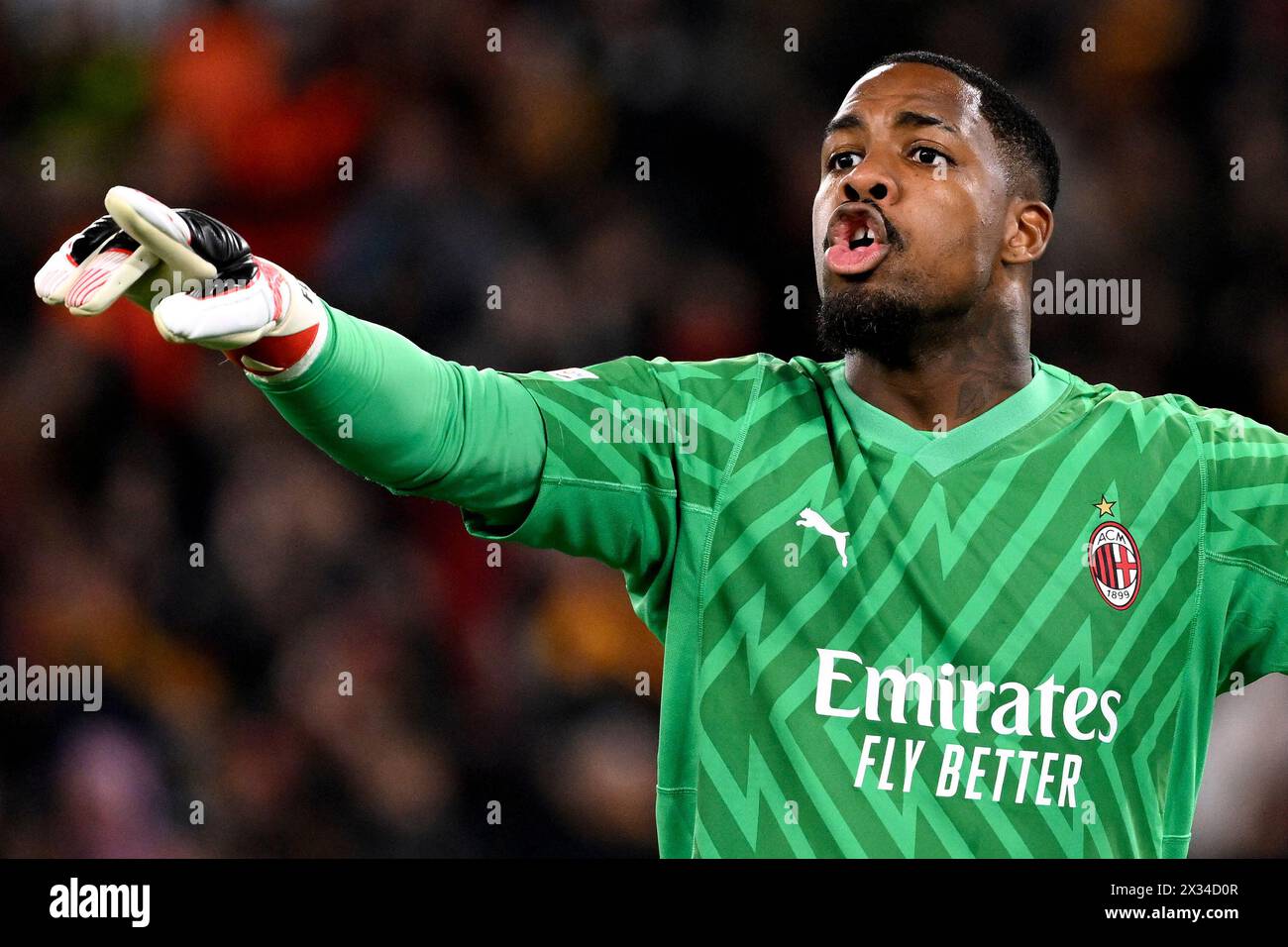 Mike Maignan of AC Milan gestures during the Europa League football ...
