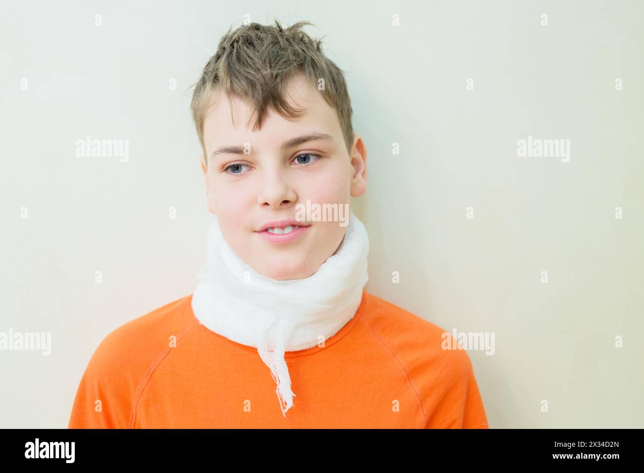 young boy with neck brace, used for pain in neck, limited range of ...