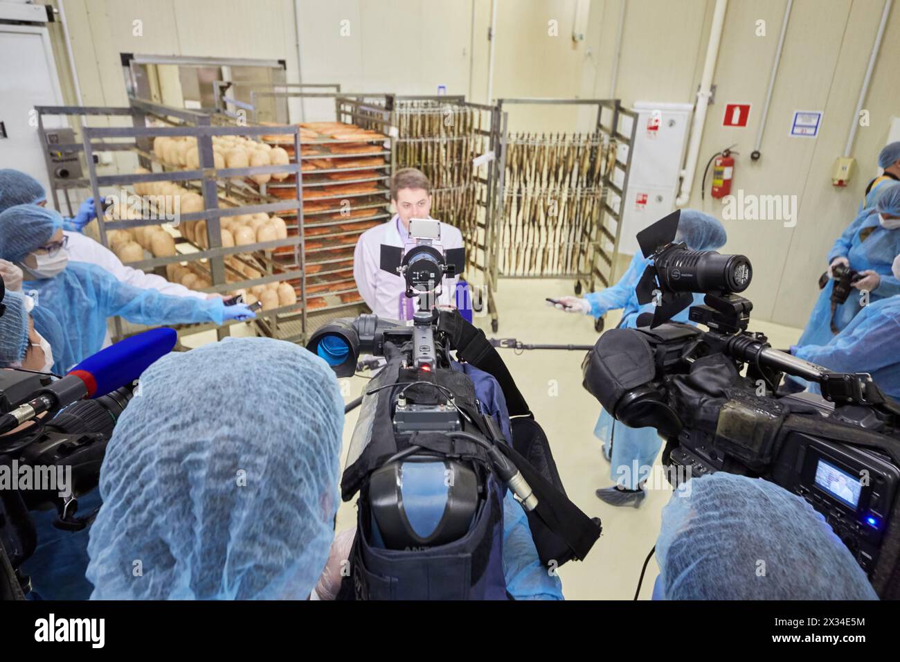 Reporters interview head of the department of trade and services at ...