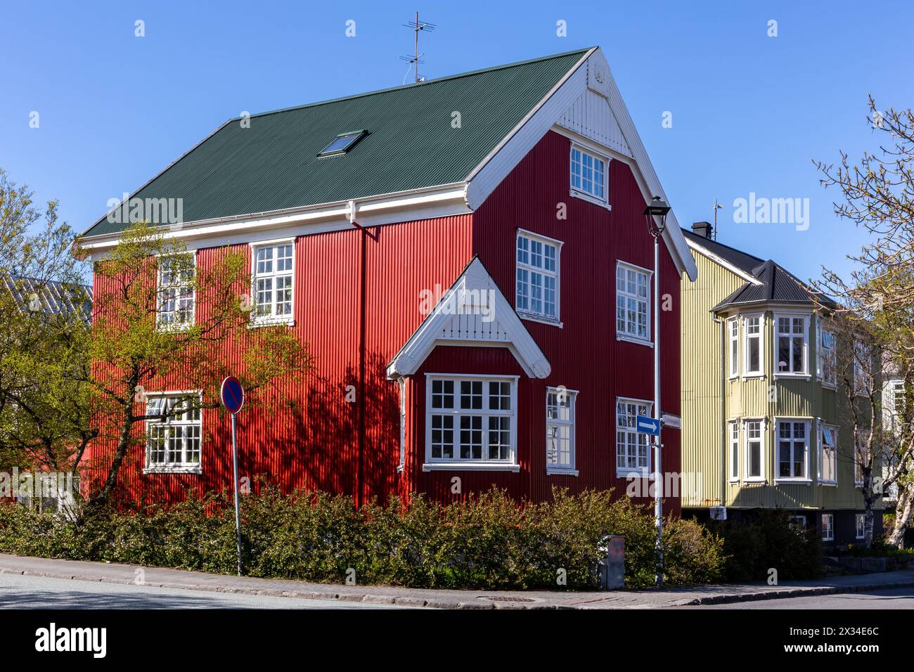 Traditional Icelandic red and green residential buildings with gable ...