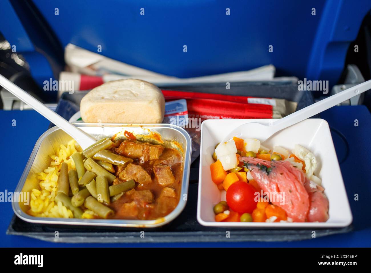 lunch in airplane on a blue table Stock Photo - Alamy