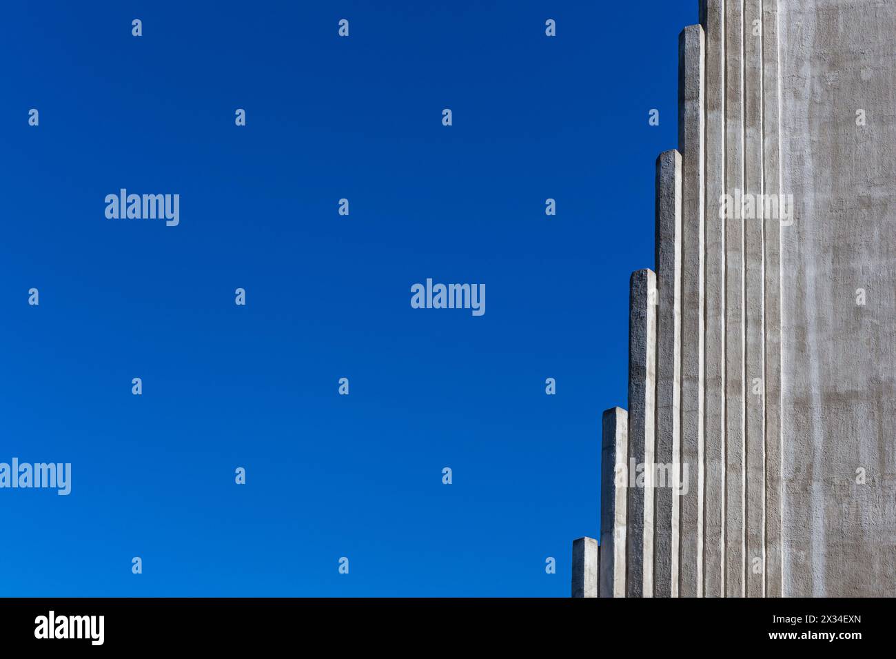 Grey pillars in ascending order as steps, close-up view of the ...